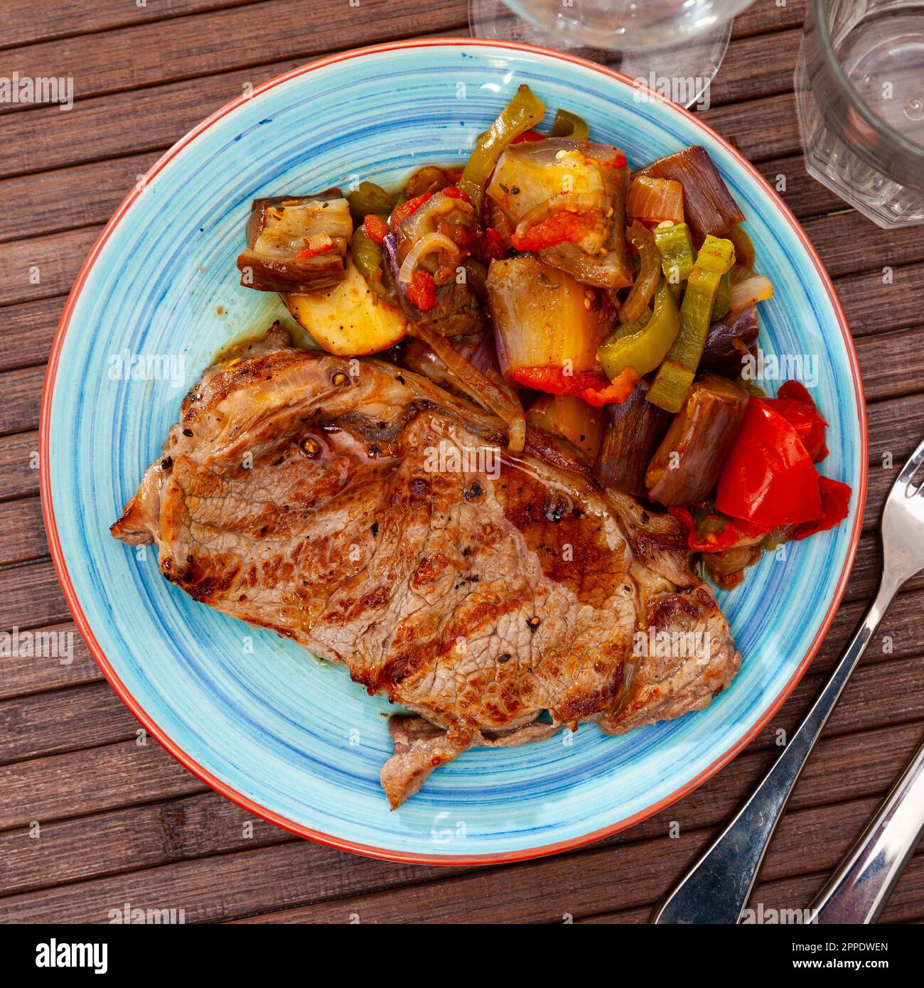 Grilled veal with sauteed vegetables, healthy dinner Stock Photo - Alamy