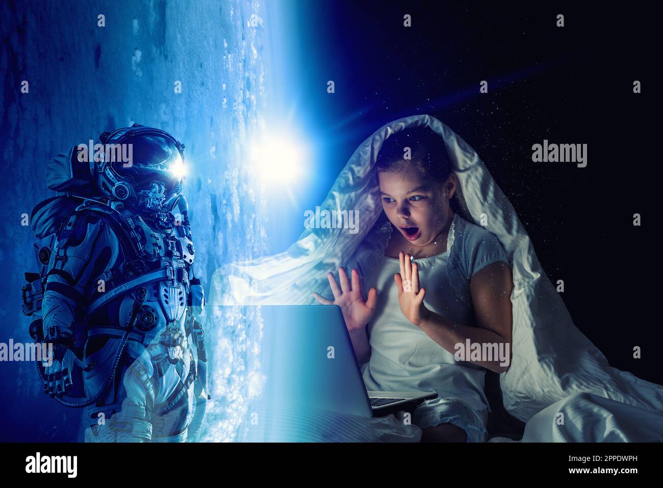 Little girl in front of computer Stock Photo - Alamy