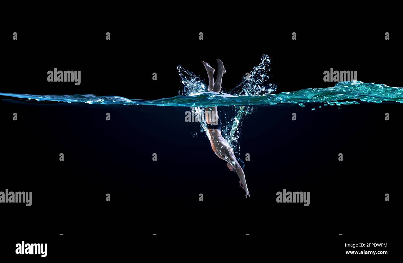 Professional man swimmer on a wave Stock Photo - Alamy