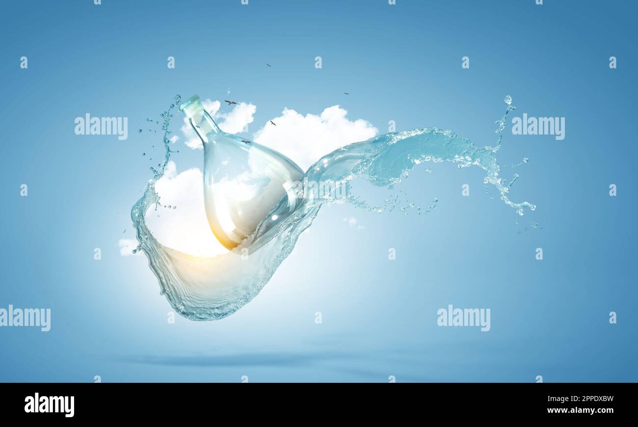 Water splash out of glass bottle Stock Photo - Alamy