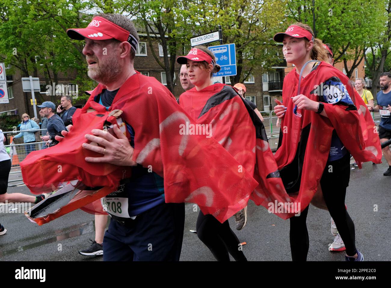 London, UK. 23rd April, 2023. Runners proceed along Jamaica Road, the ...