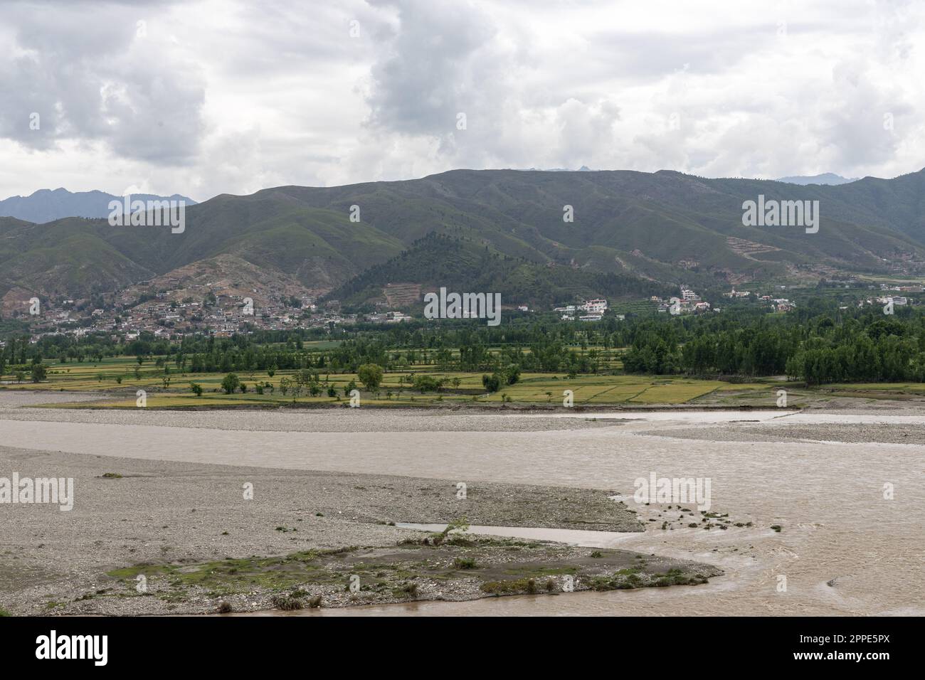 Beautiful landscape of green fields and flooded river in spring Stock ...