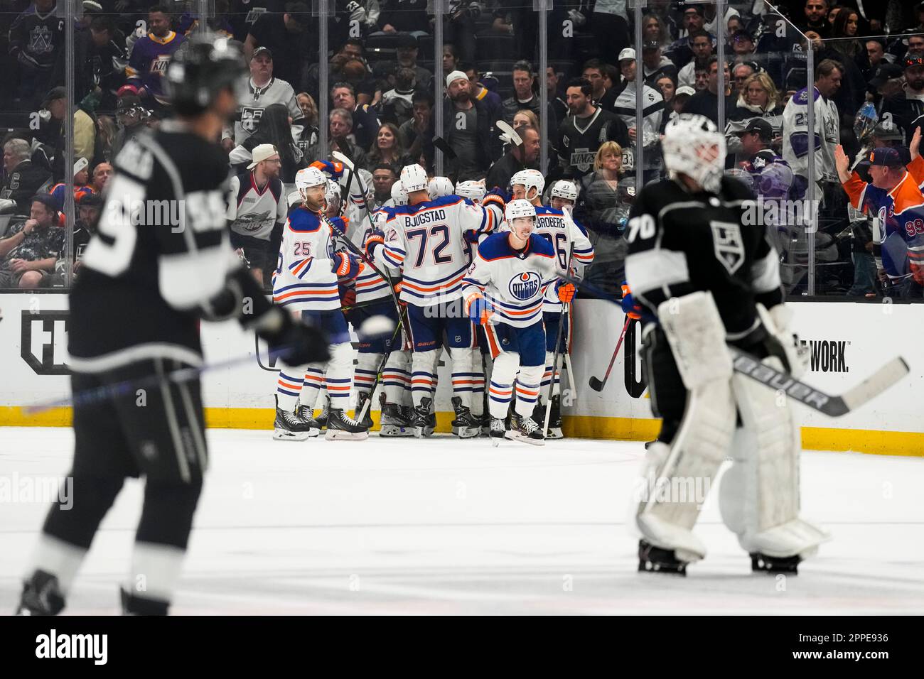 Edmonton Oilers players celebrate after a 5-4 win over the Los Angeles ...
