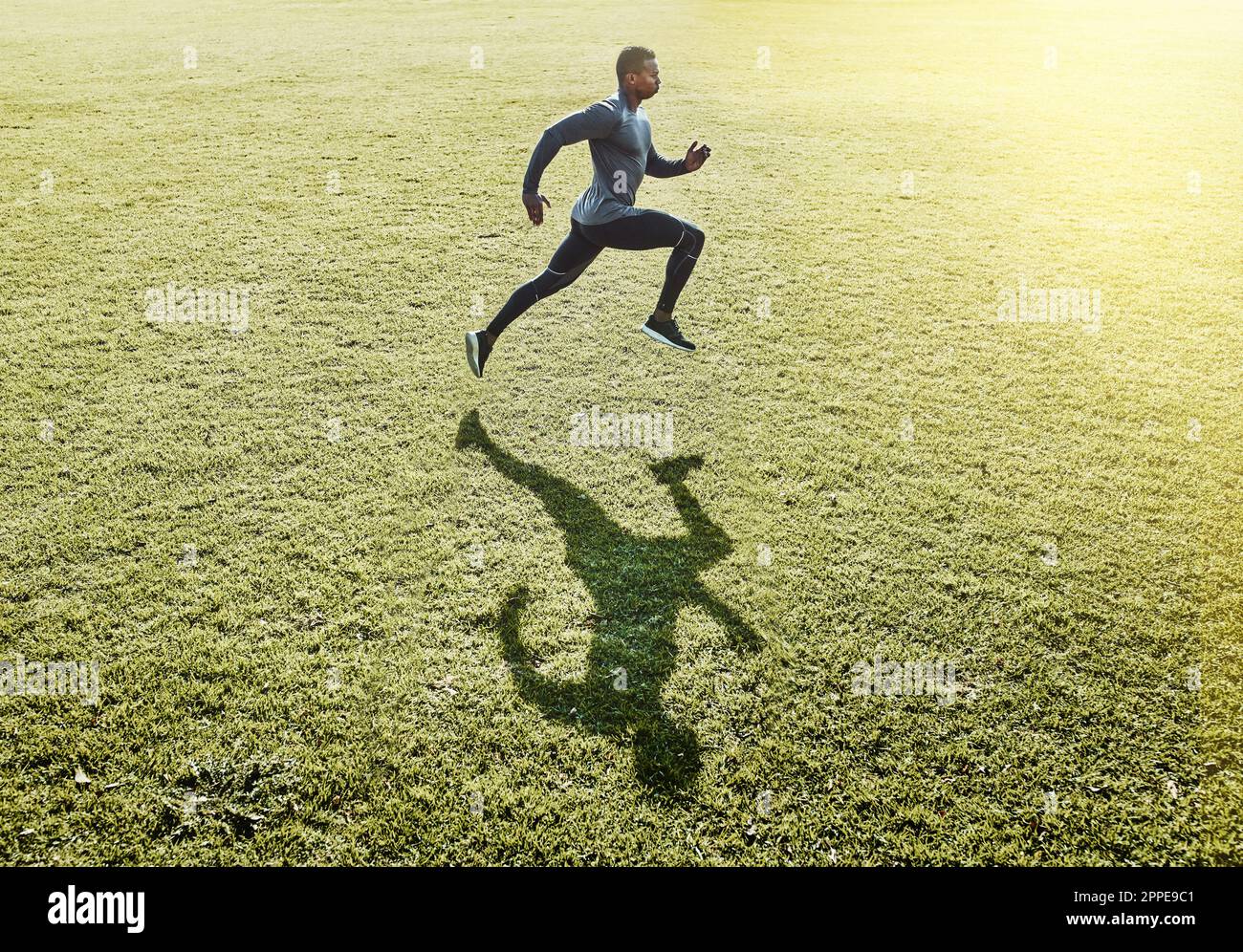 Working up a sweat. Full length shot of a handsome and athletic young ...