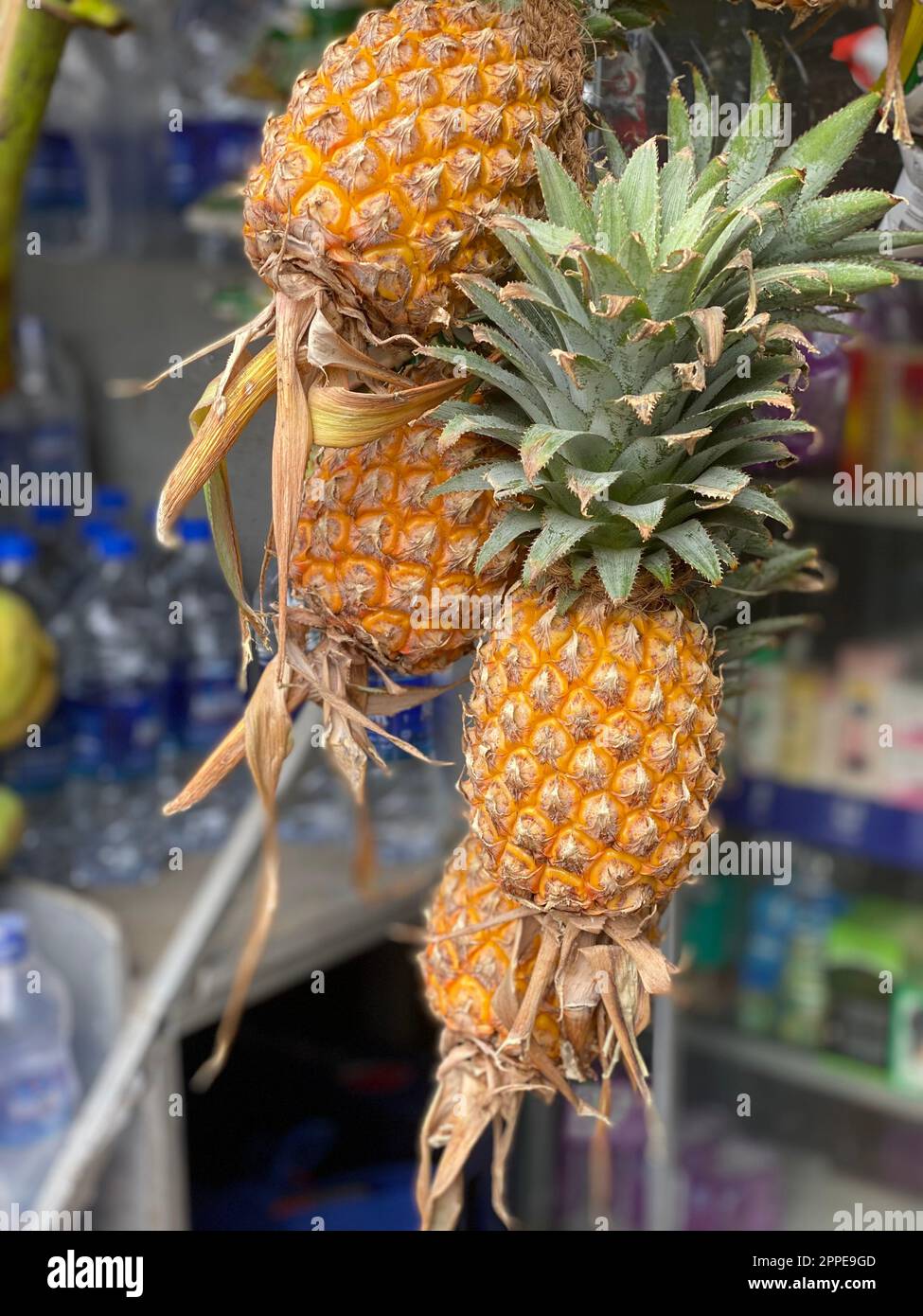 pineapple in a fruit shop Stock Photo - Alamy