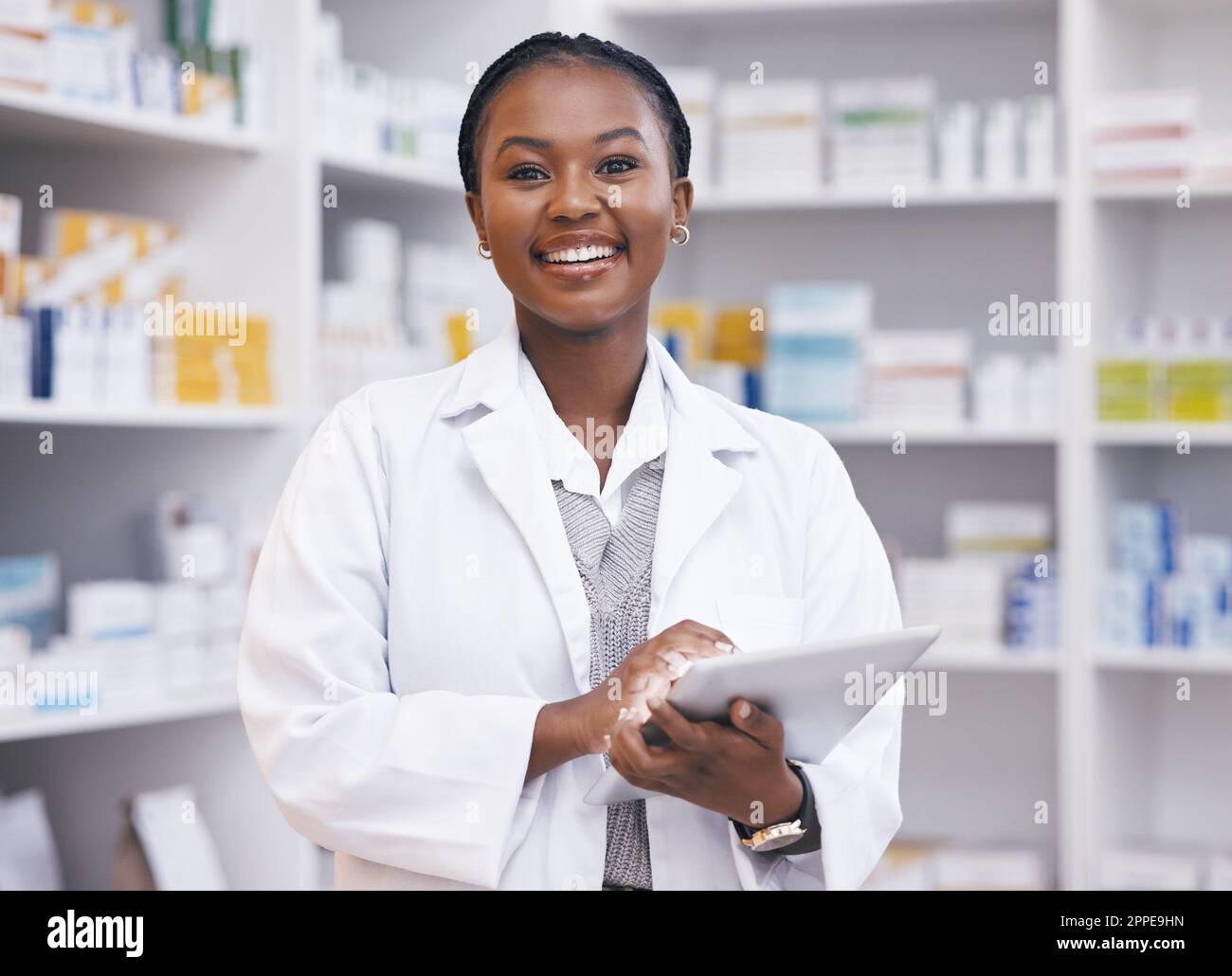 Portrait of black woman in pharmacy with tablet, smile and online ...