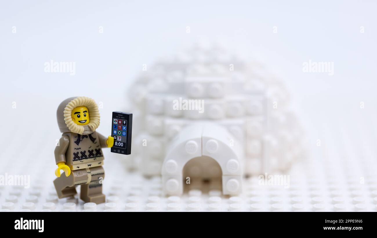 man dress like inuk and living in snow house Stock Photo - Alamy