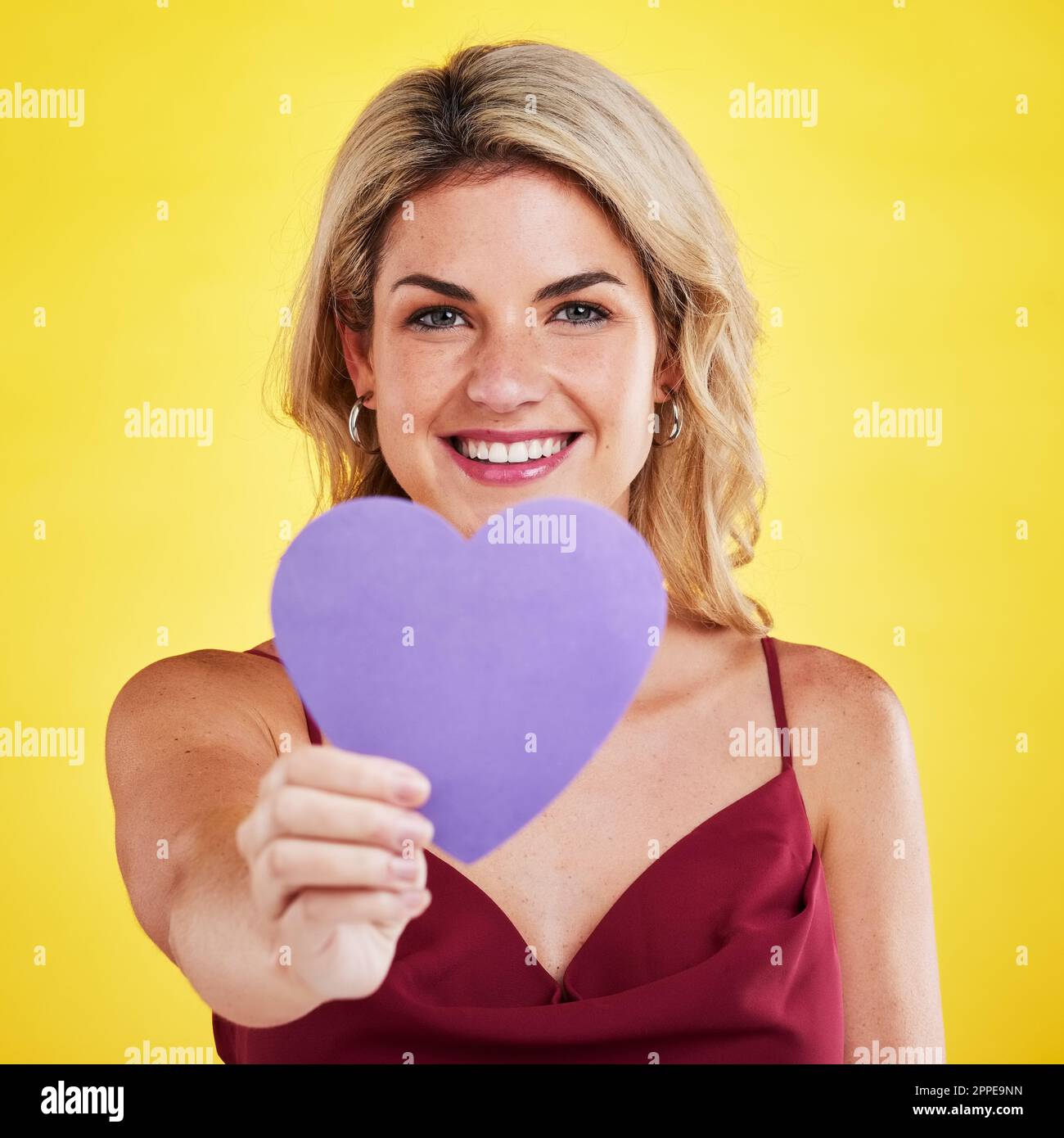 Portrait, heart and woman with wellness, emoji and happiness against a ...