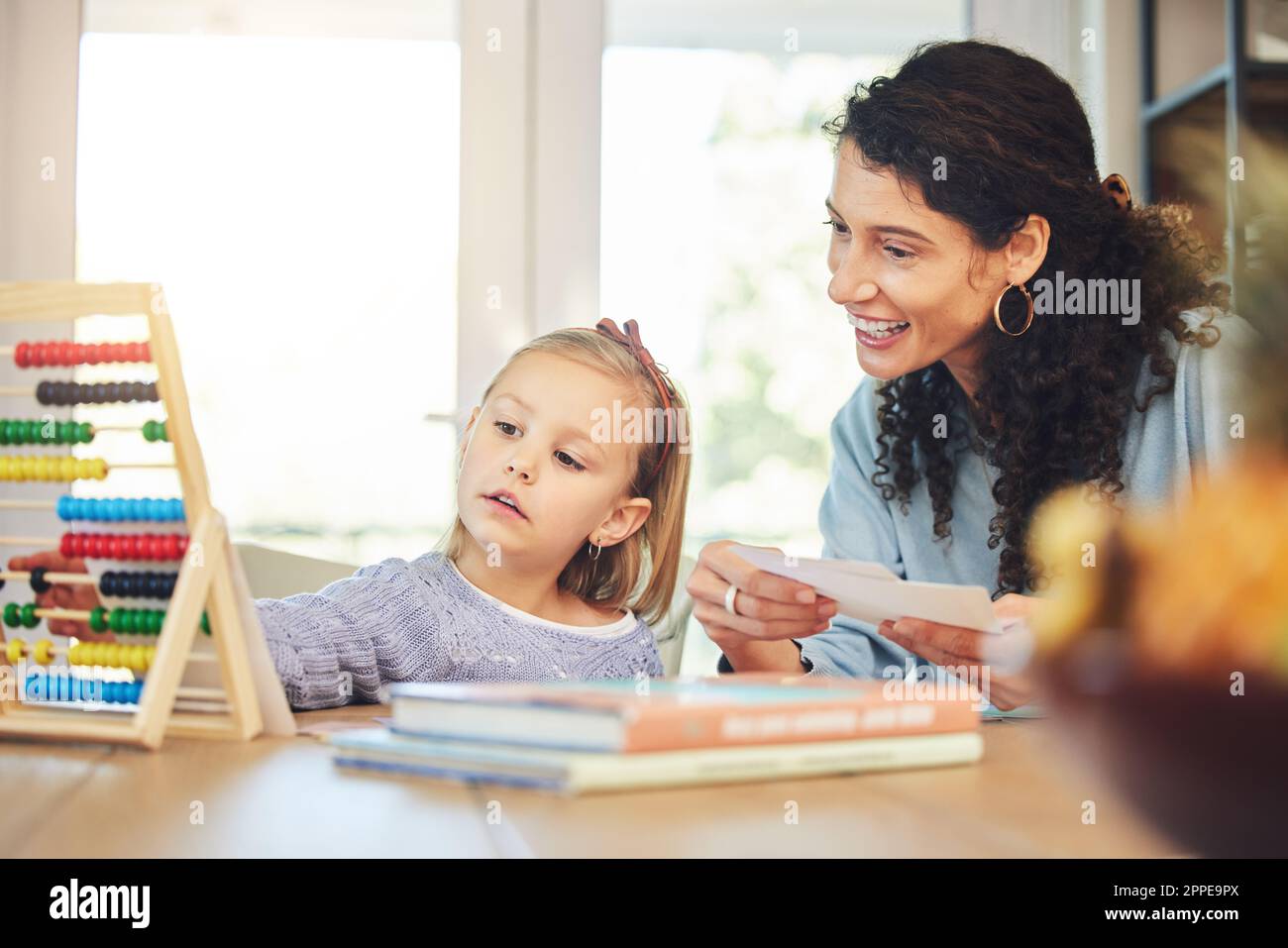 Education, abacus and mother and girl in home with teaching for lesson ...