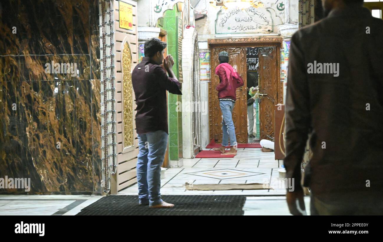 City: Nagpur, Month:April 23 2023 Description: a perosn praying in ...