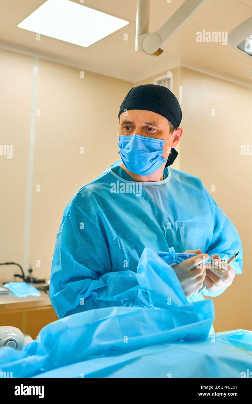 Plastic surgeon operates on hi-res stock photography and images - Alamy