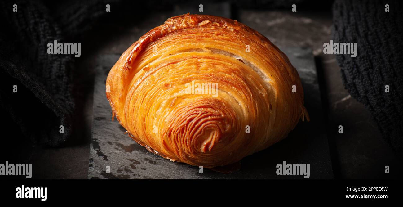 Delicious golden brown baked crispy and flaky plain buttery croissant ...