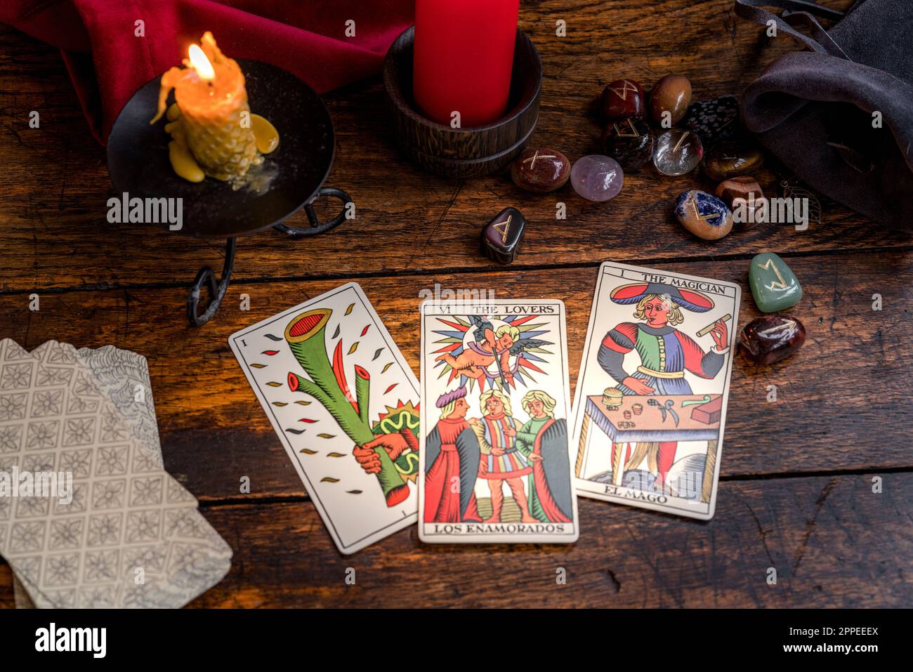 Reading a future by tarot cards on rustic wooden table. Three tarot ...