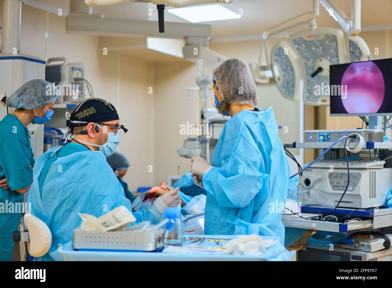 plastic surgeon operates on a patient in the operating room Stock Photo ...