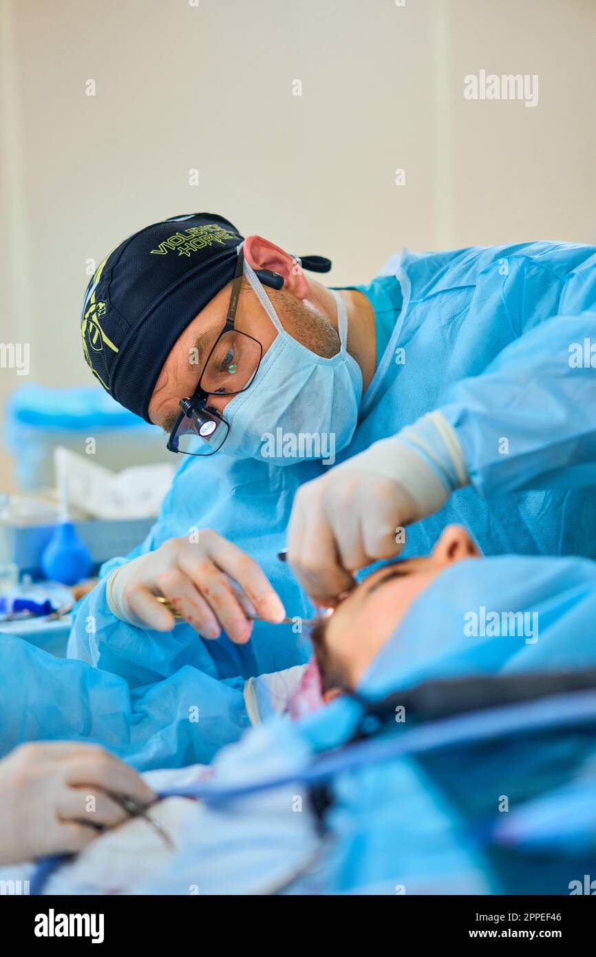 Abdominoplasty plastic surgery team surgeon hi-res stock photography ...
