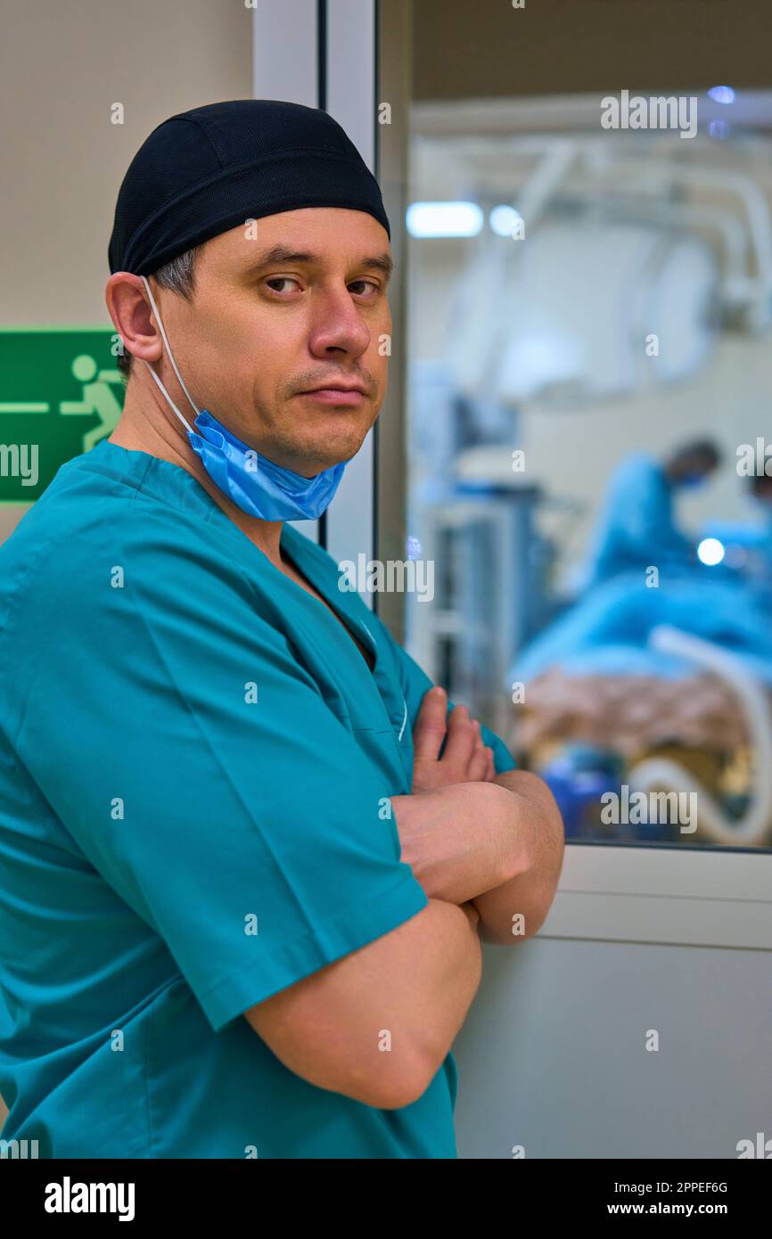 surgeon is standing near the operating room Stock Photo - Alamy