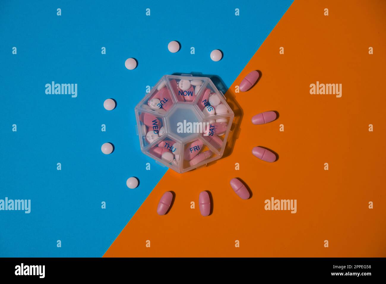 Organizer weekly shots medical pill box with doses of tablets for daily ...