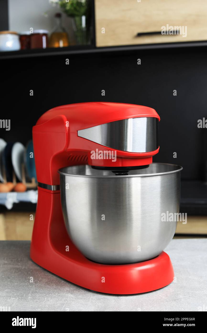 Modern stand mixer on table in kitchen. Home appliance Stock Photo - Alamy