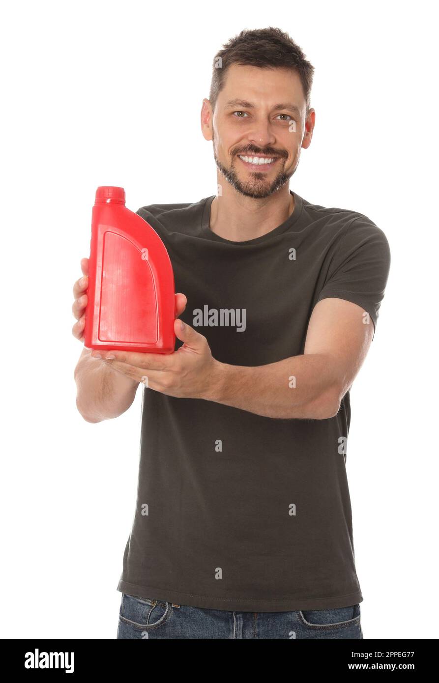 Man showing red container of motor oil on white background Stock Photo ...