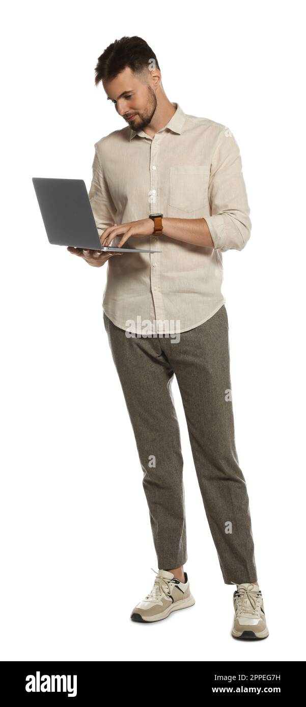 Handsome man working with laptop on white background Stock Photo - Alamy
