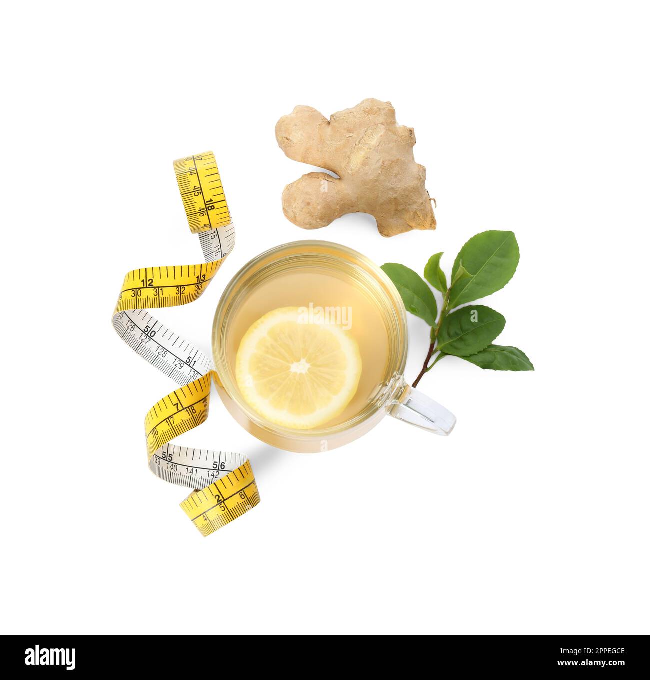 Diet herbal tea, measuring tape, ginger and leaves on white background ...