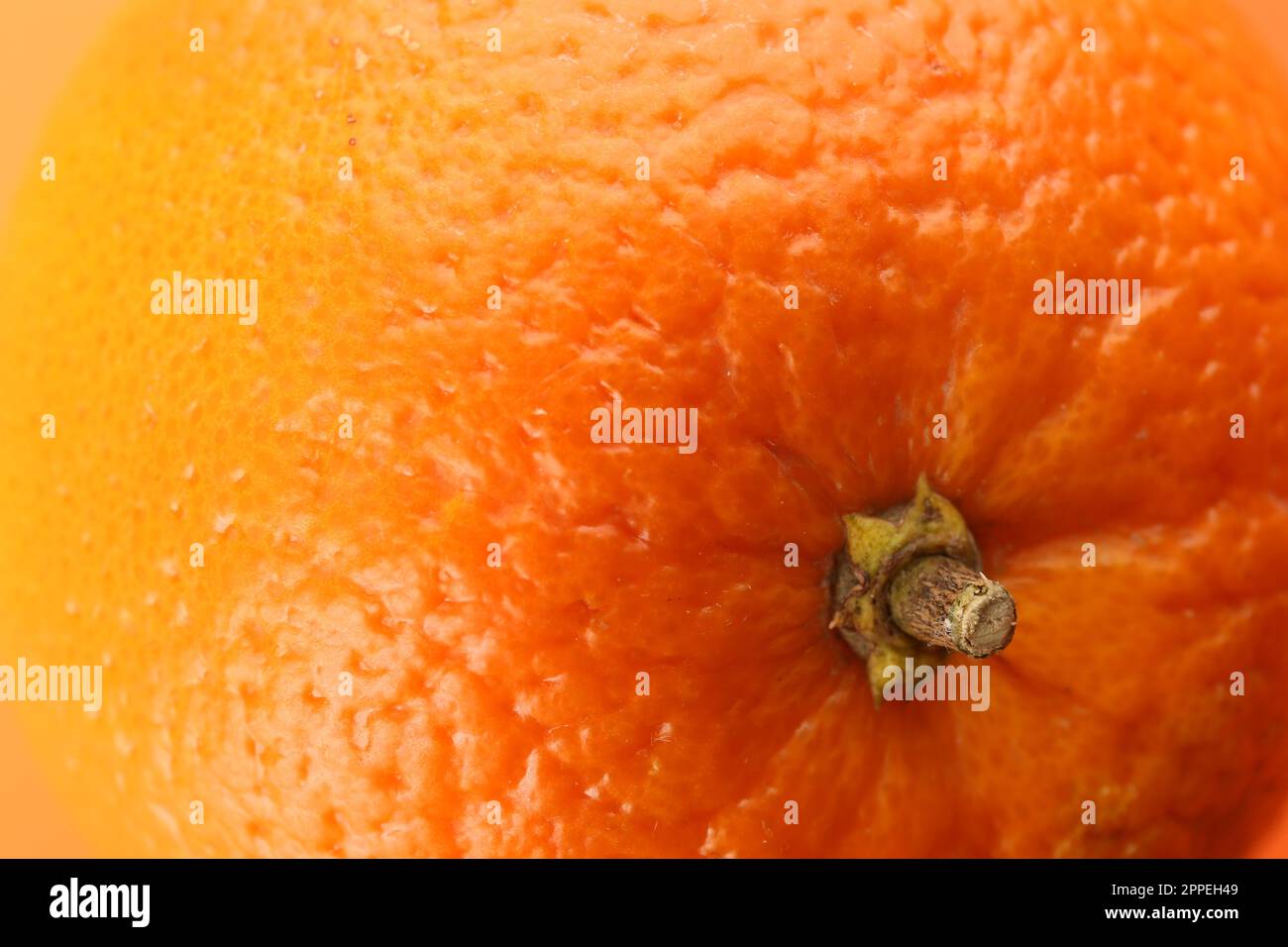 Delicious unpeeled orange fruit as background, closeup Stock Photo - Alamy