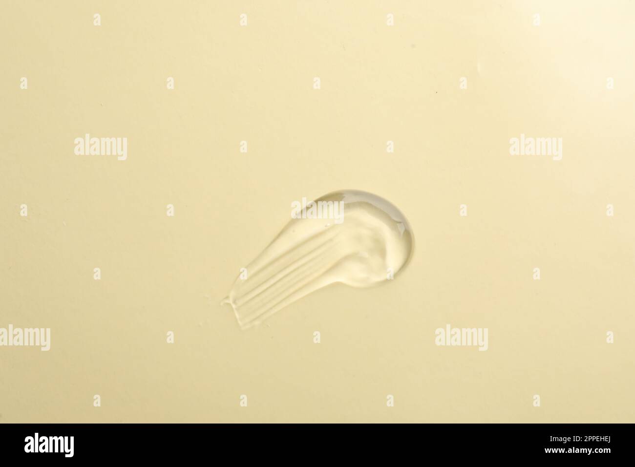 Smear of transparent ointment on beige background, top view Stock Photo ...