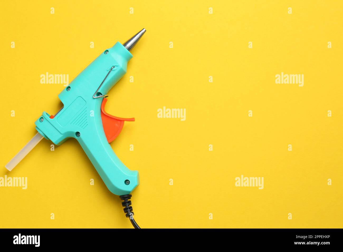Yellow silicone glue gun hi-res stock photography and images - Alamy