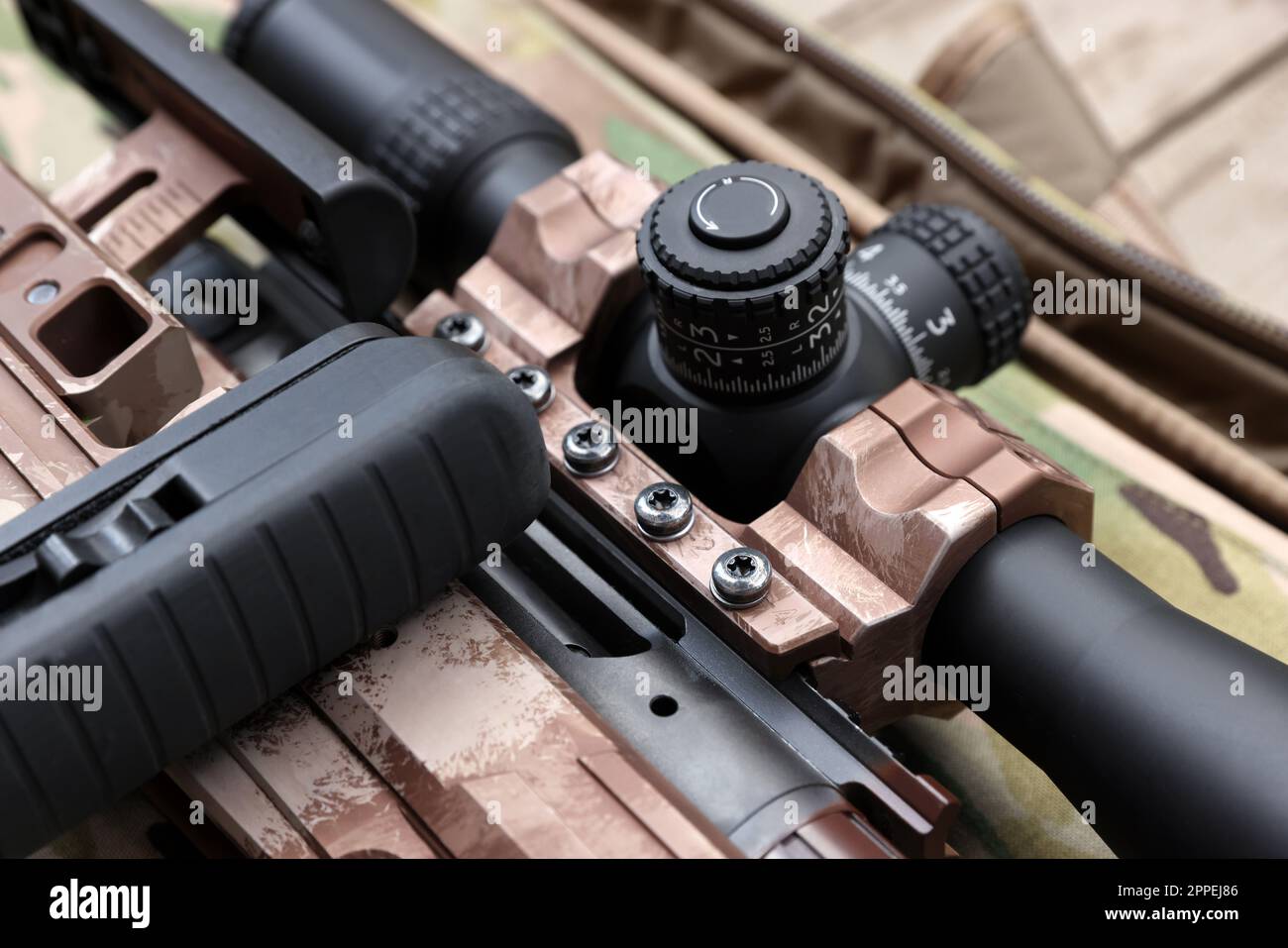 Closeup view of modern powerful sniper rifle with telescopic sight on ...
