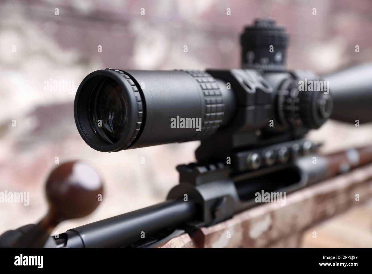 Closeup view of modern powerful sniper rifle with telescopic sight on ...