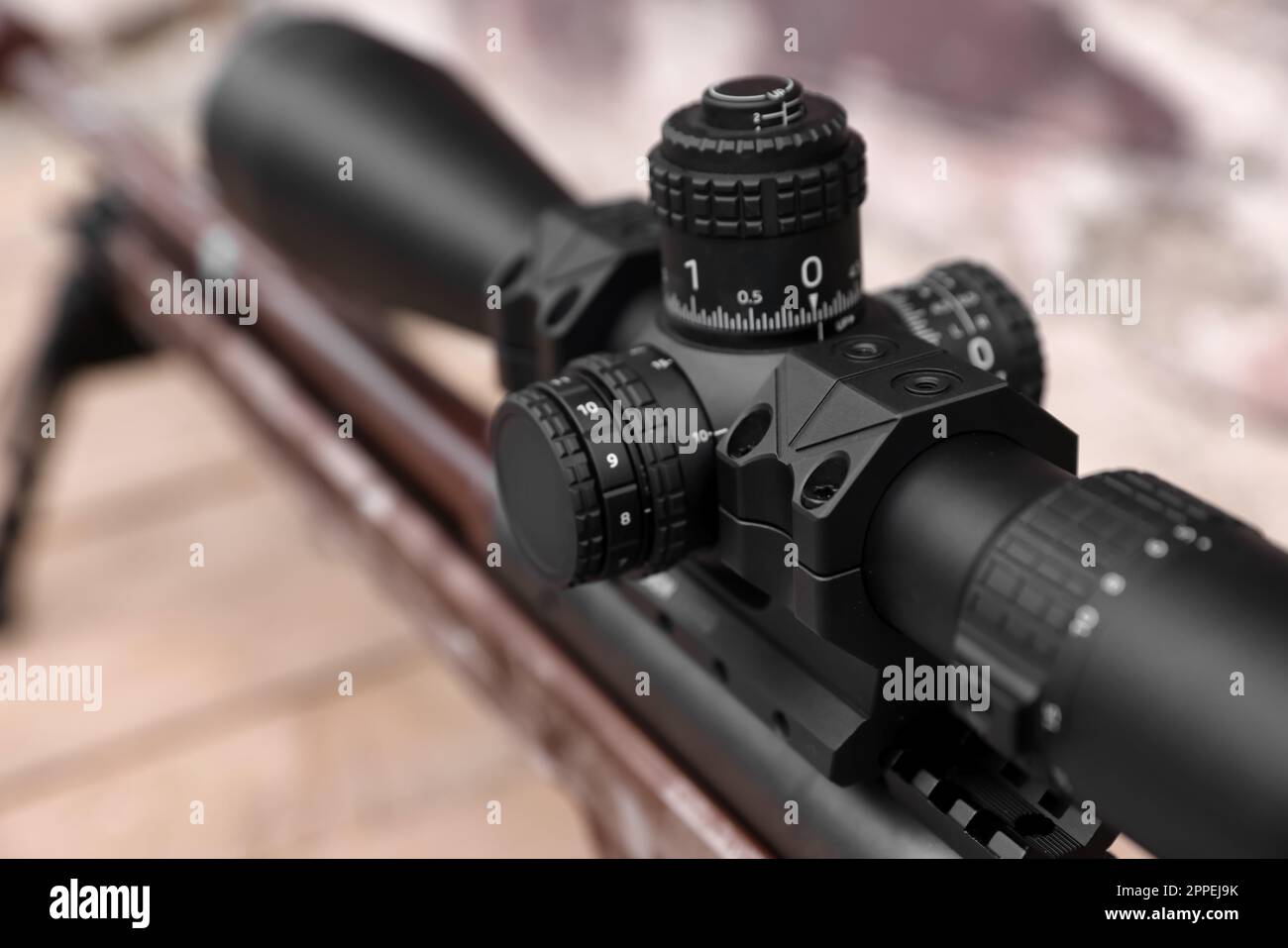 Closeup view of modern powerful sniper rifle with telescopic sight on ...