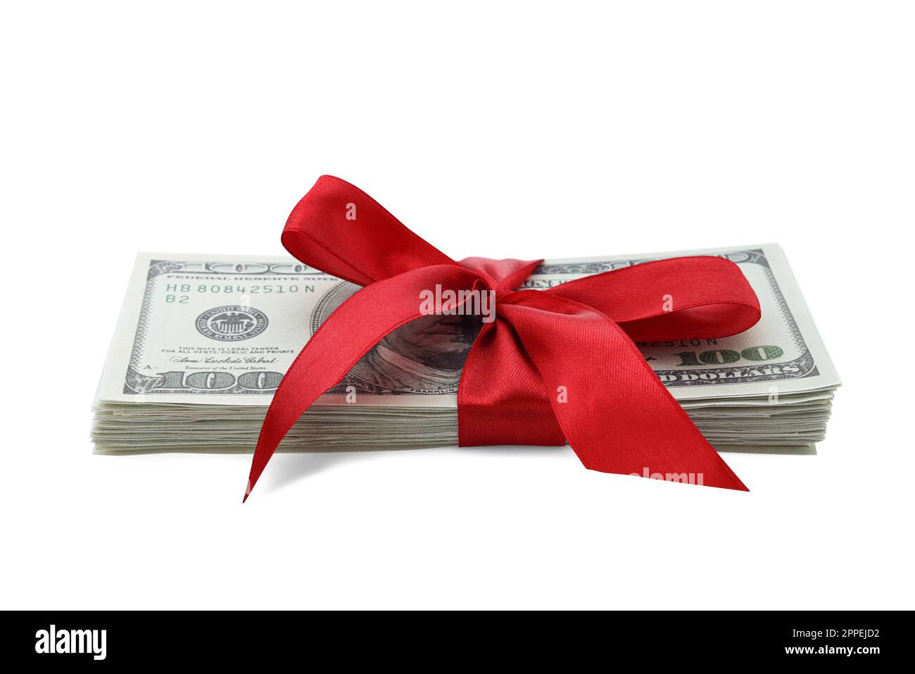 Stack of dollar banknotes with red ribbon isolated on white Stock Photo ...