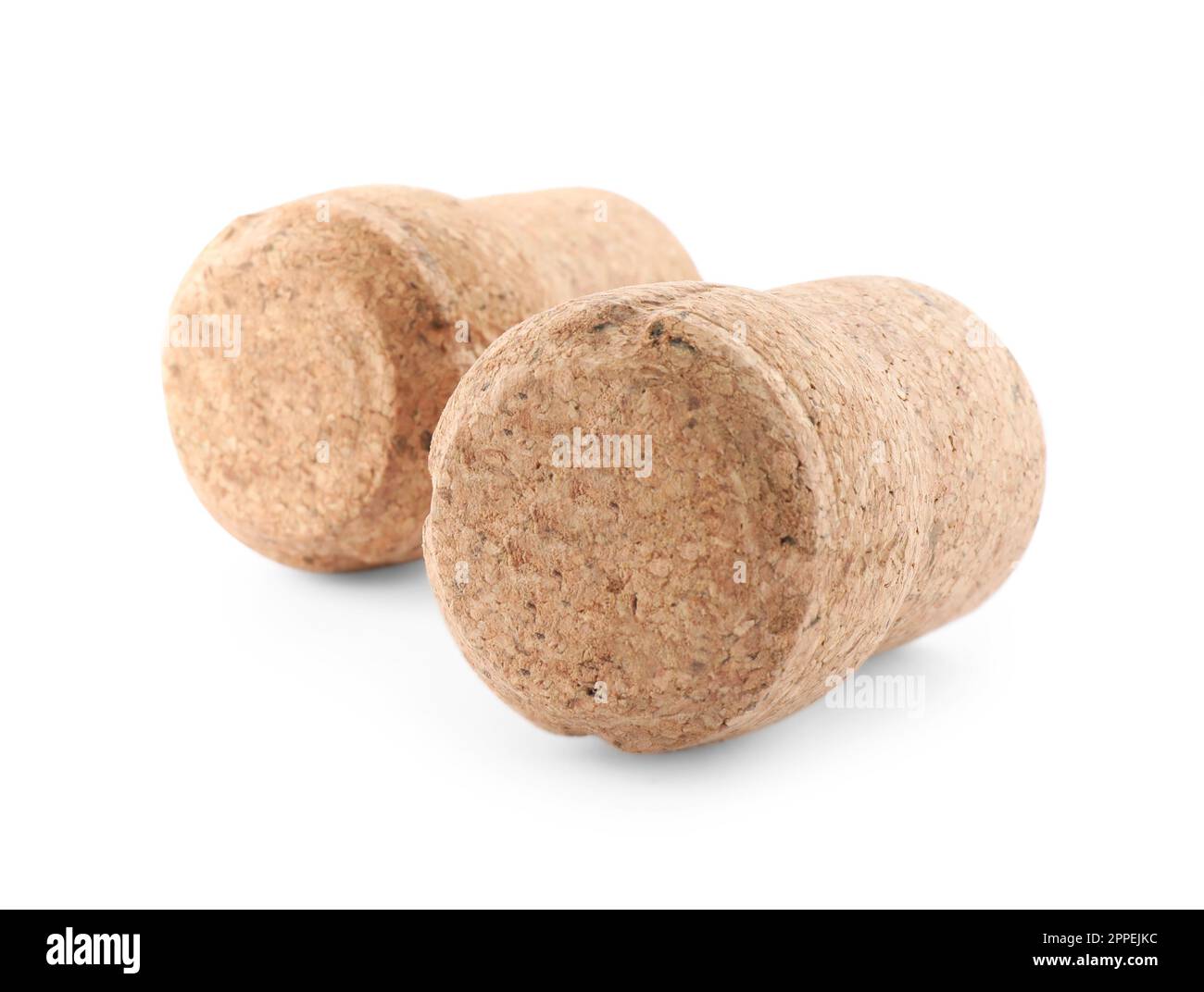 Two sparkling wine corks on white background Stock Photo - Alamy