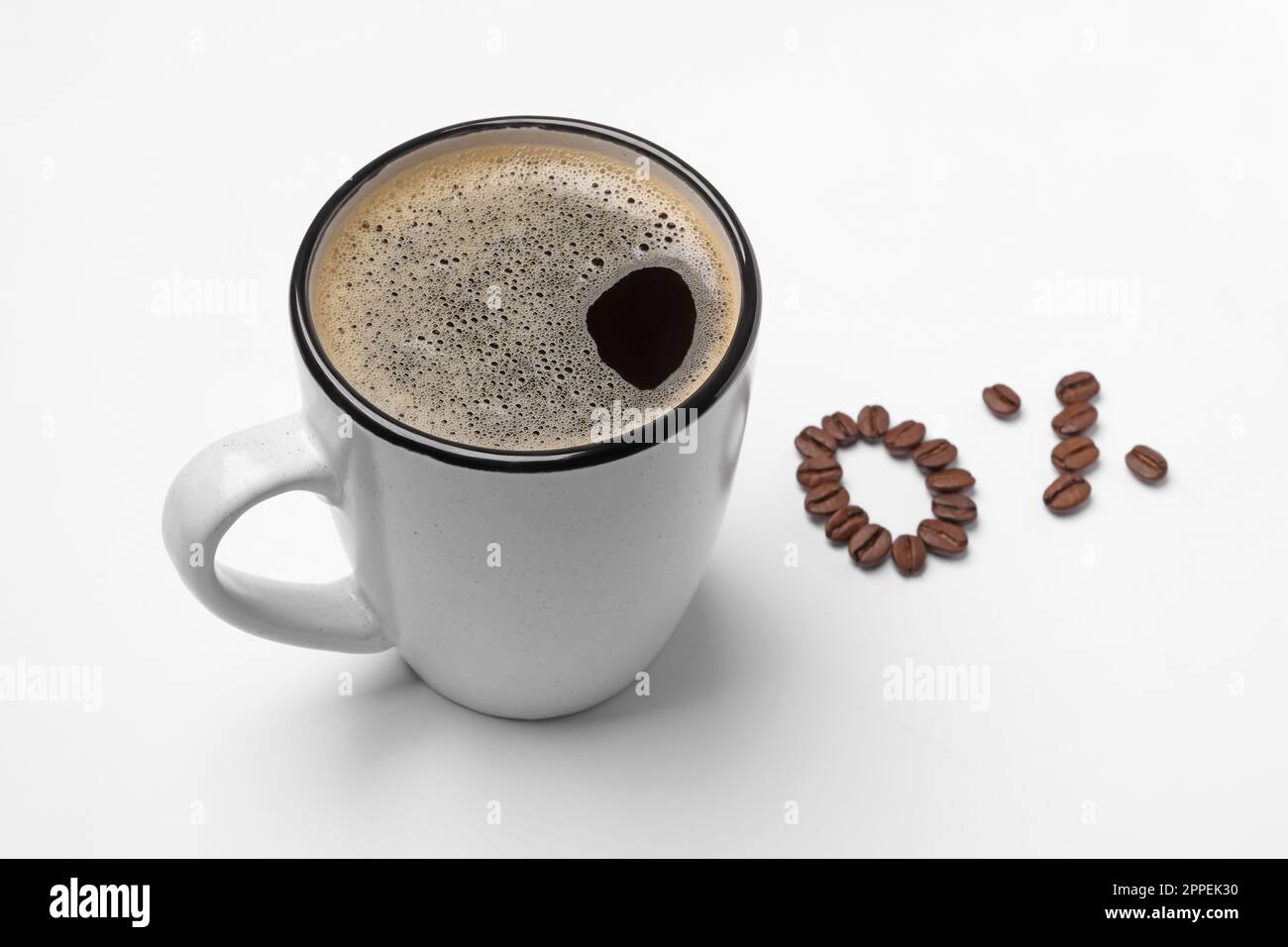 Cup of coffee and 0 percent made with beans on white background ...