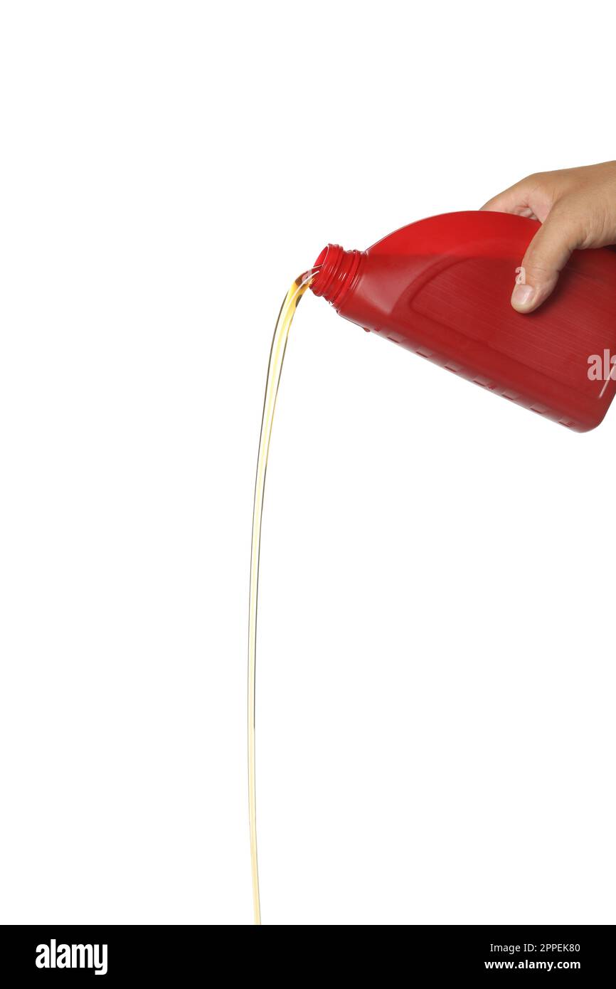Man pouring motor oil from red container on white background, closeup ...