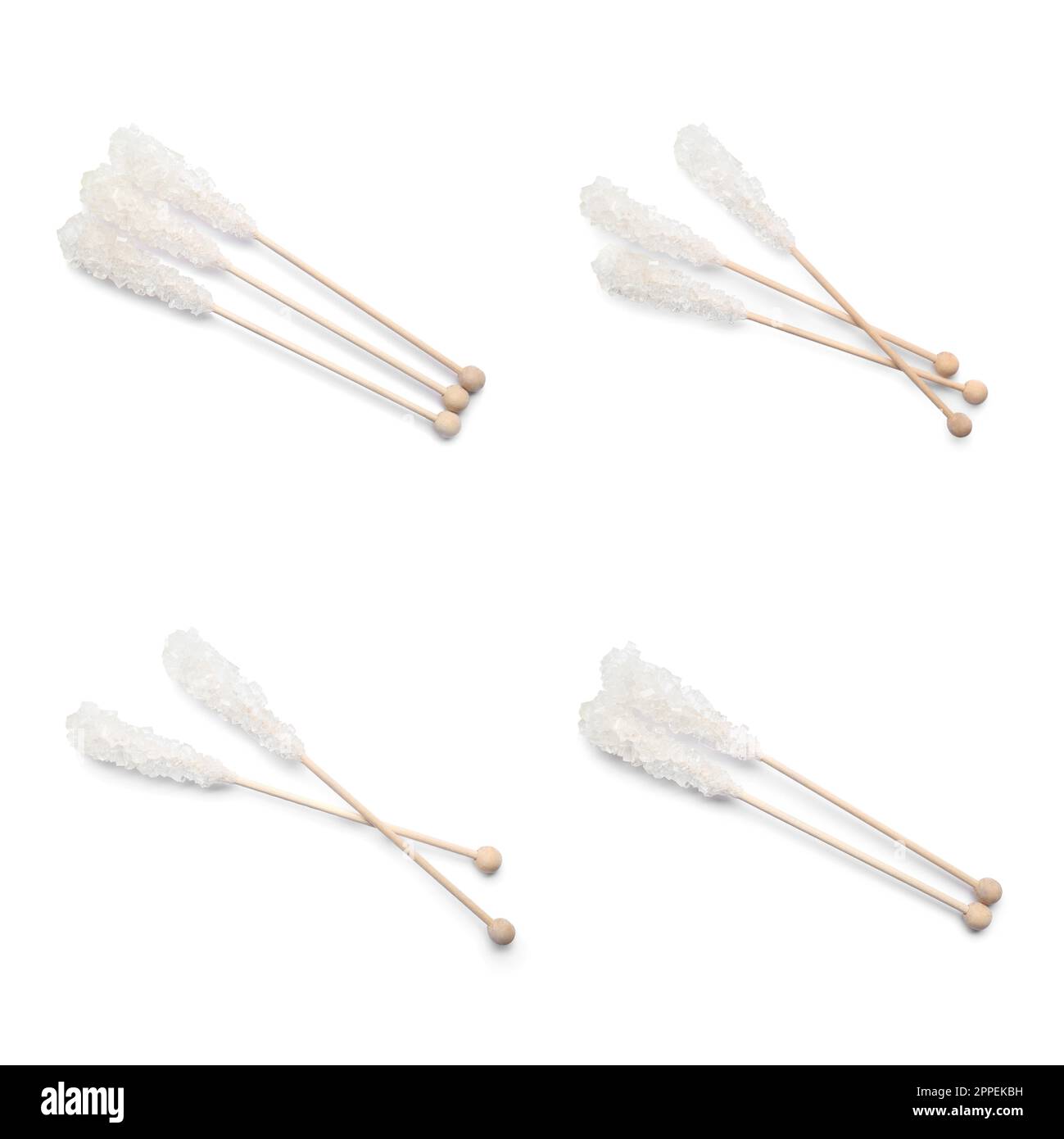 Set of wooden sticks with sugar crystals on white background. Tasty ...