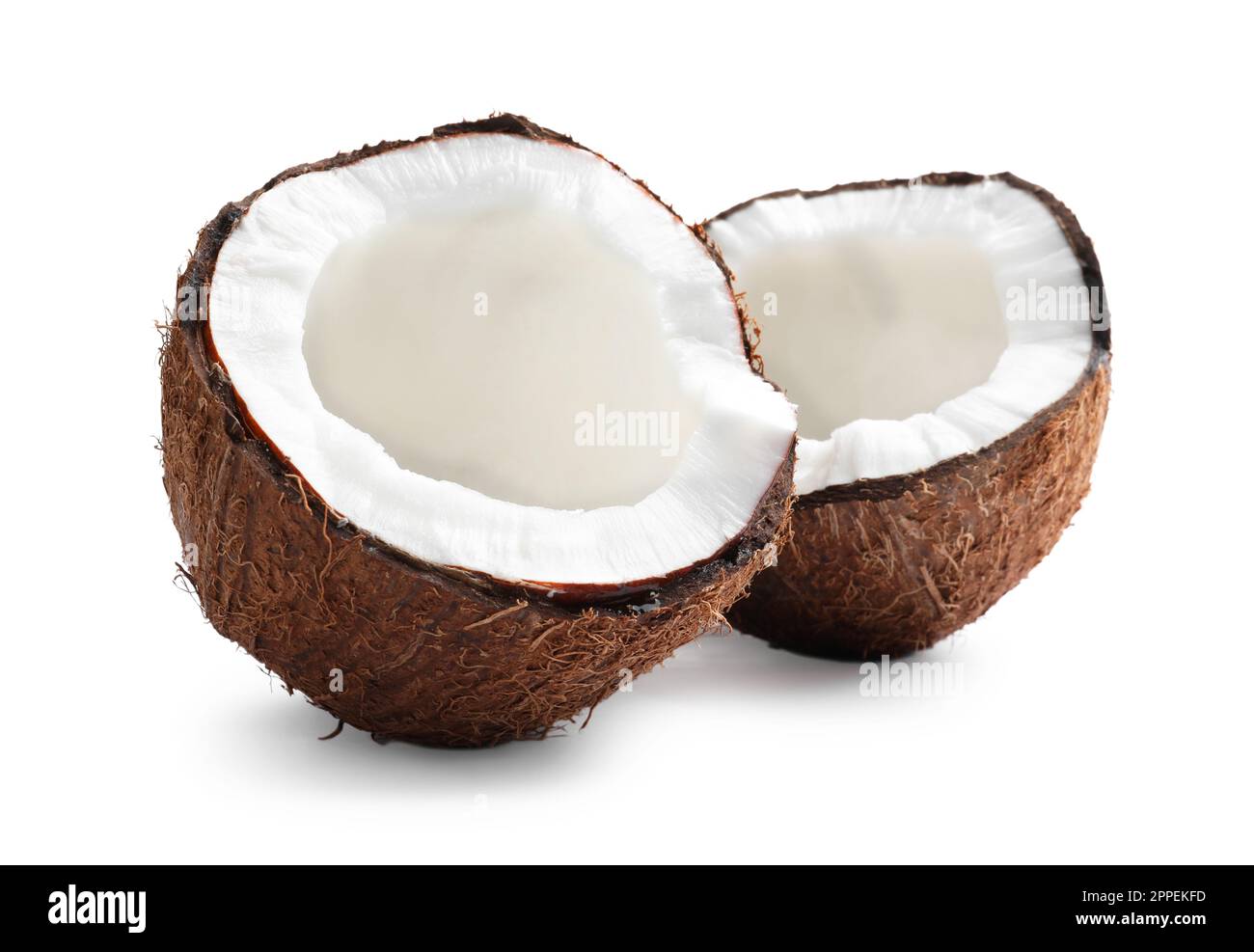 Halves of fresh ripe coconut on white background Stock Photo - Alamy