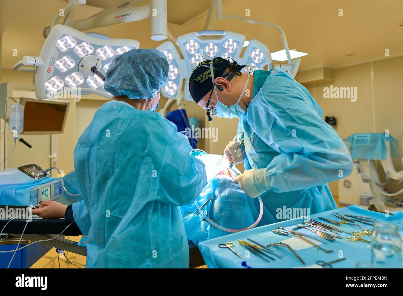 plastic surgeon operates on a patient in the operating room Stock Photo ...