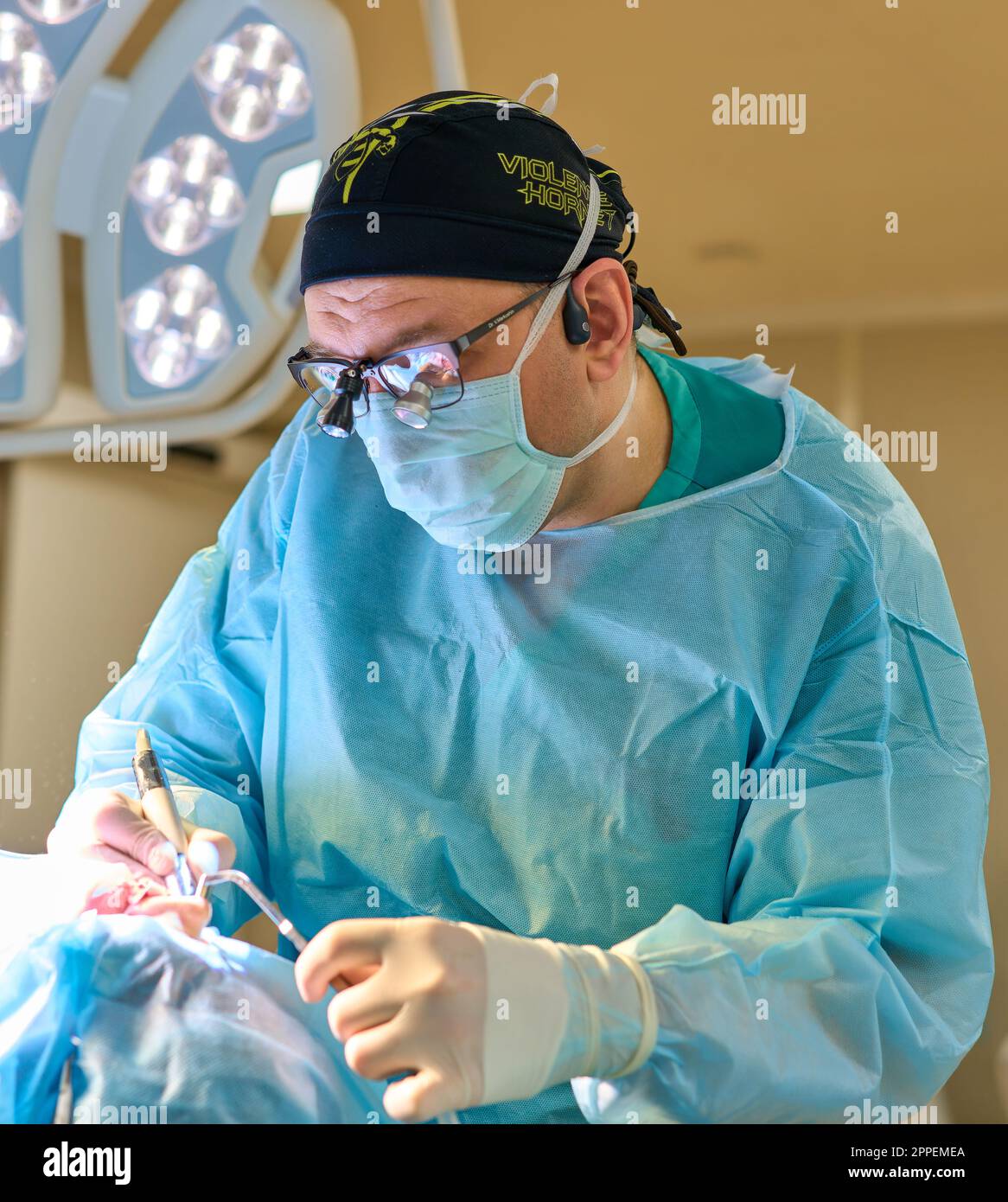 plastic surgeon operates on a patient in the operating room Stock Photo ...