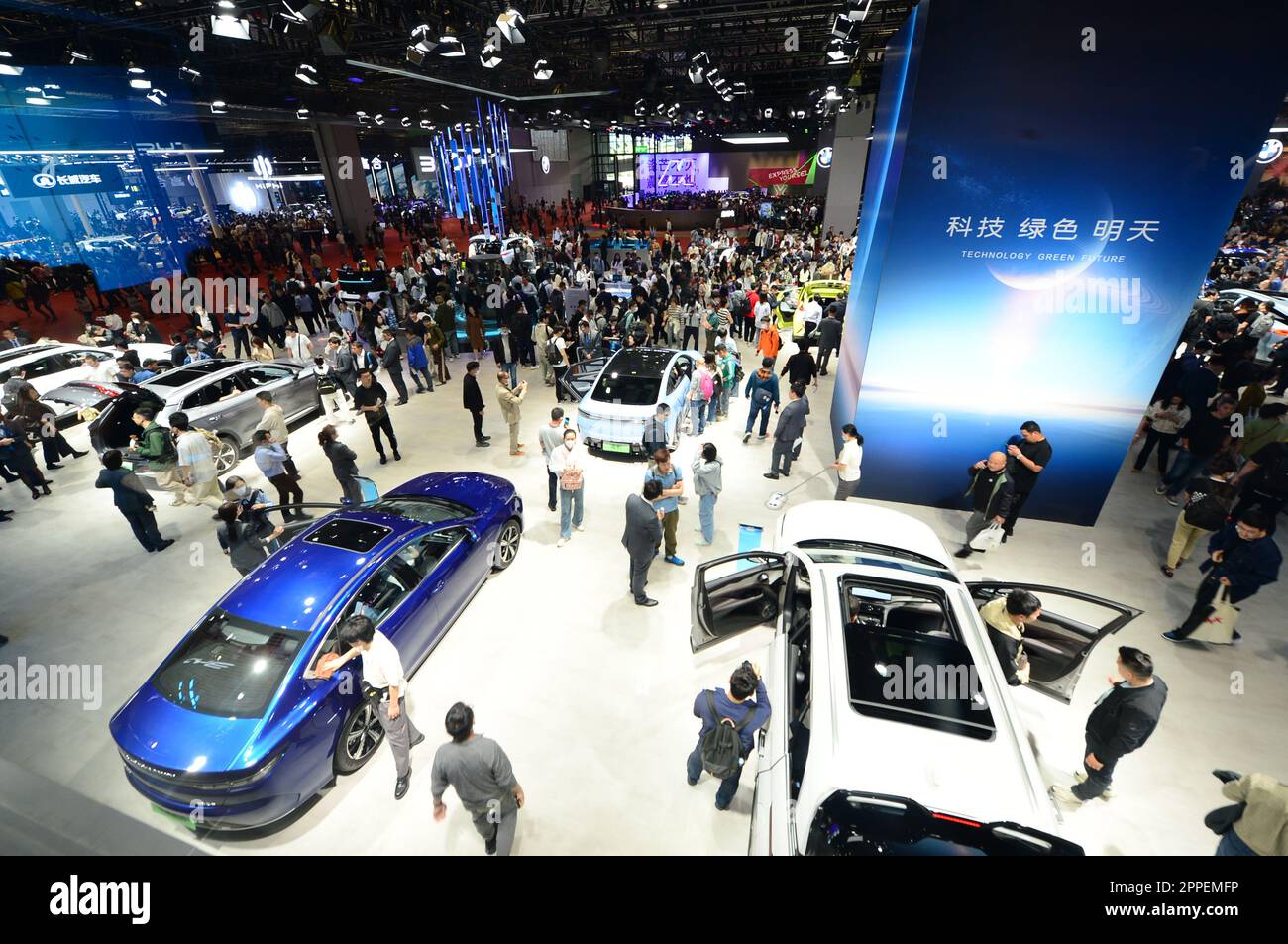 SHANGHAI, CHINA - APRIL 21, 2023 - A crowd gathers at the stand of ...