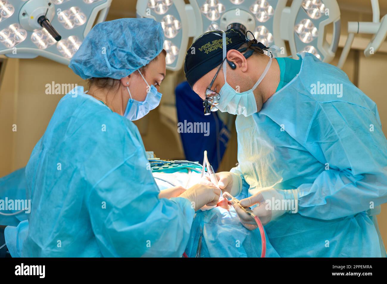 Surgeon operates on arm hi-res stock photography and images - Alamy