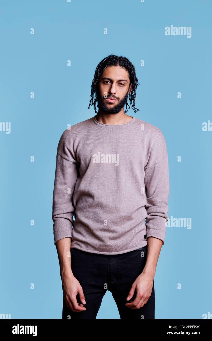 Cool confident handsome arab man standing with serious facial ...