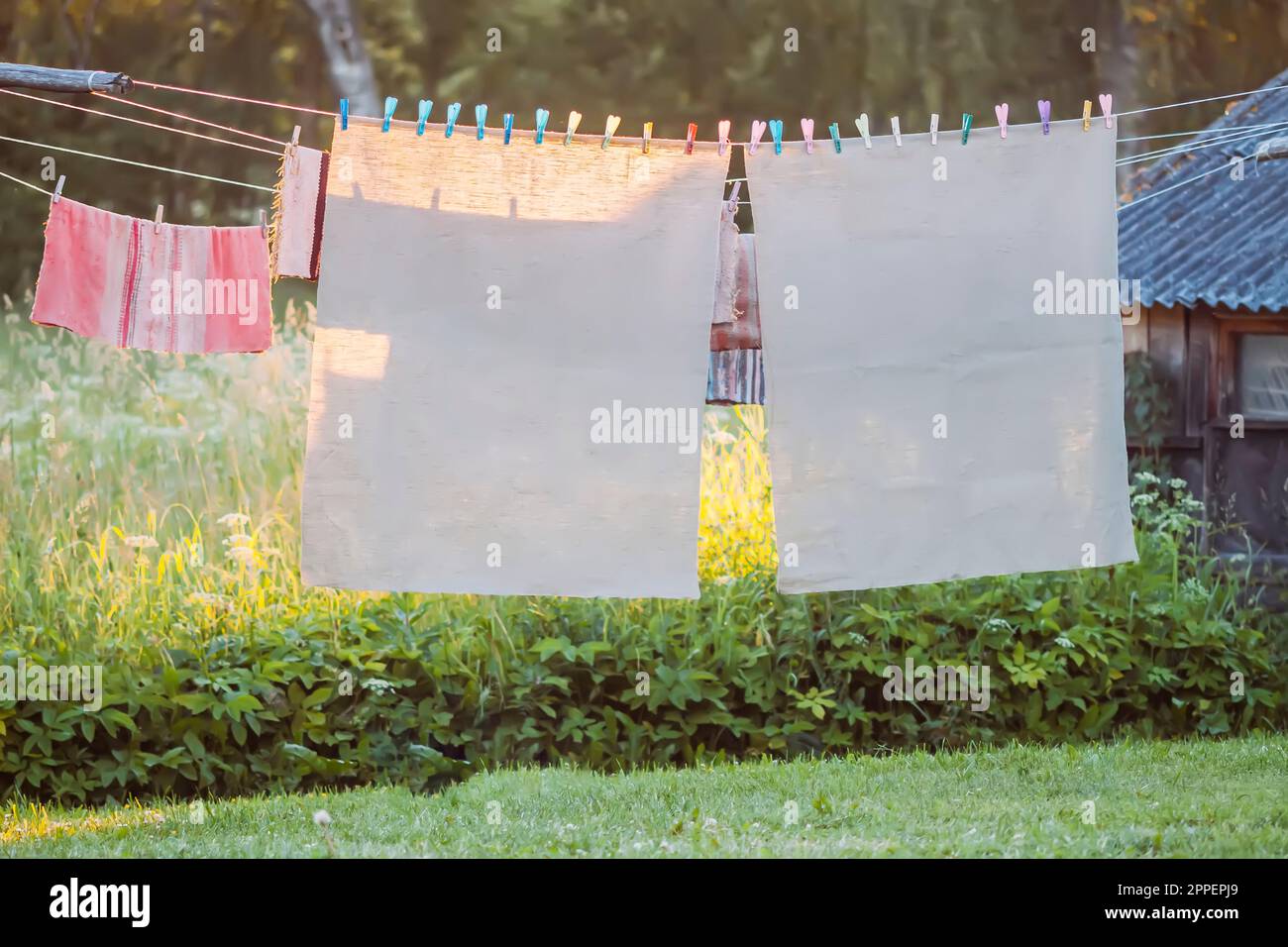 |Home textile drying on washing line outdoors Stock Photo - Alamy