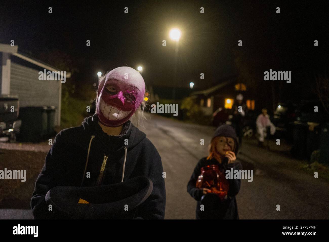 Children wearing Halloween costumes posing at night Stock Photo - Alamy