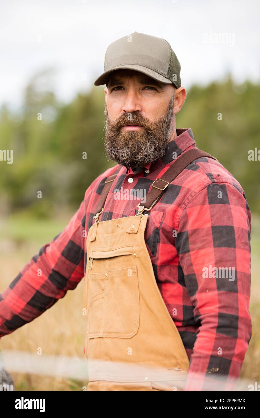 Farmer in plaid shirt hi-res stock photography and images - Alamy