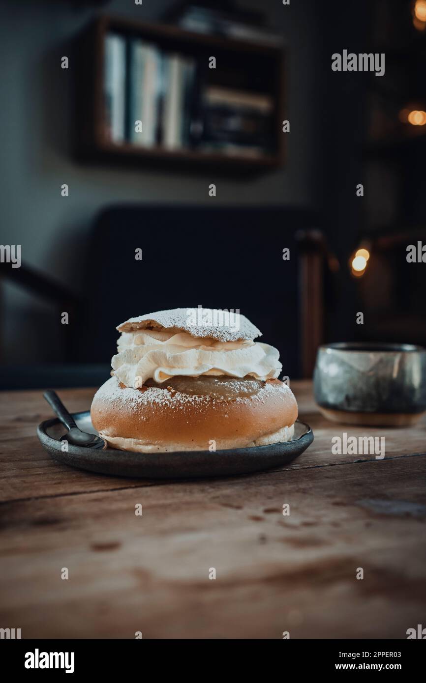 Traditional semla bun on plate Stock Photo - Alamy
