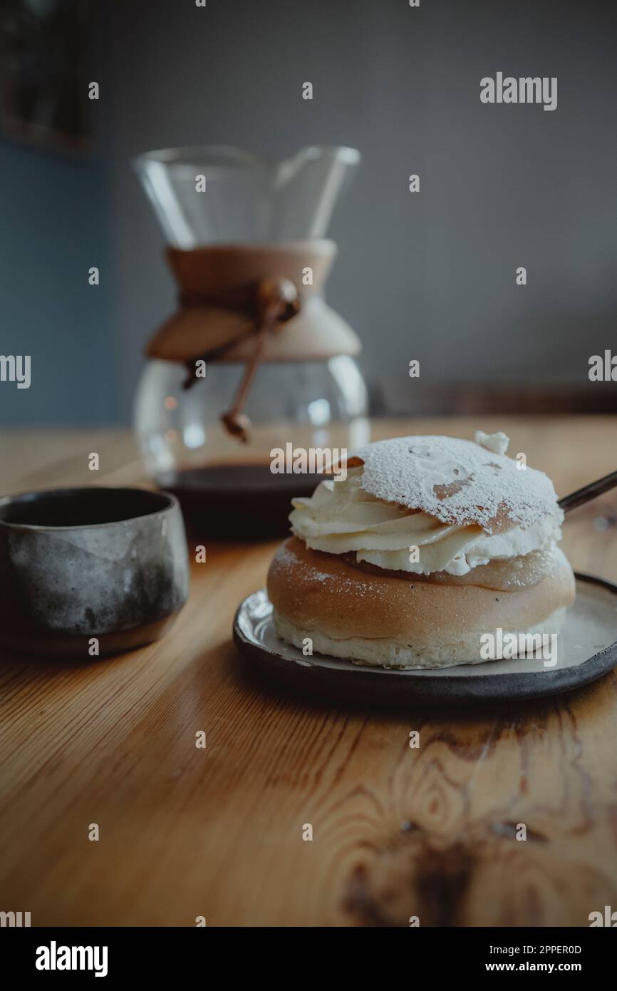 Traditional semla bun on plate Stock Photo - Alamy
