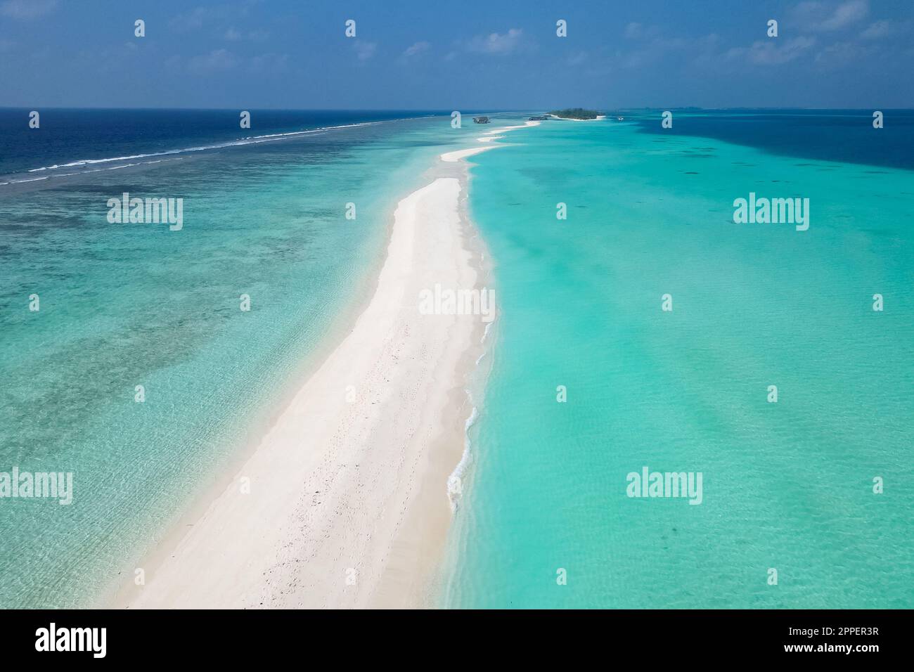 stunning blue ocean and sandy white island maldives top drone aeral ...