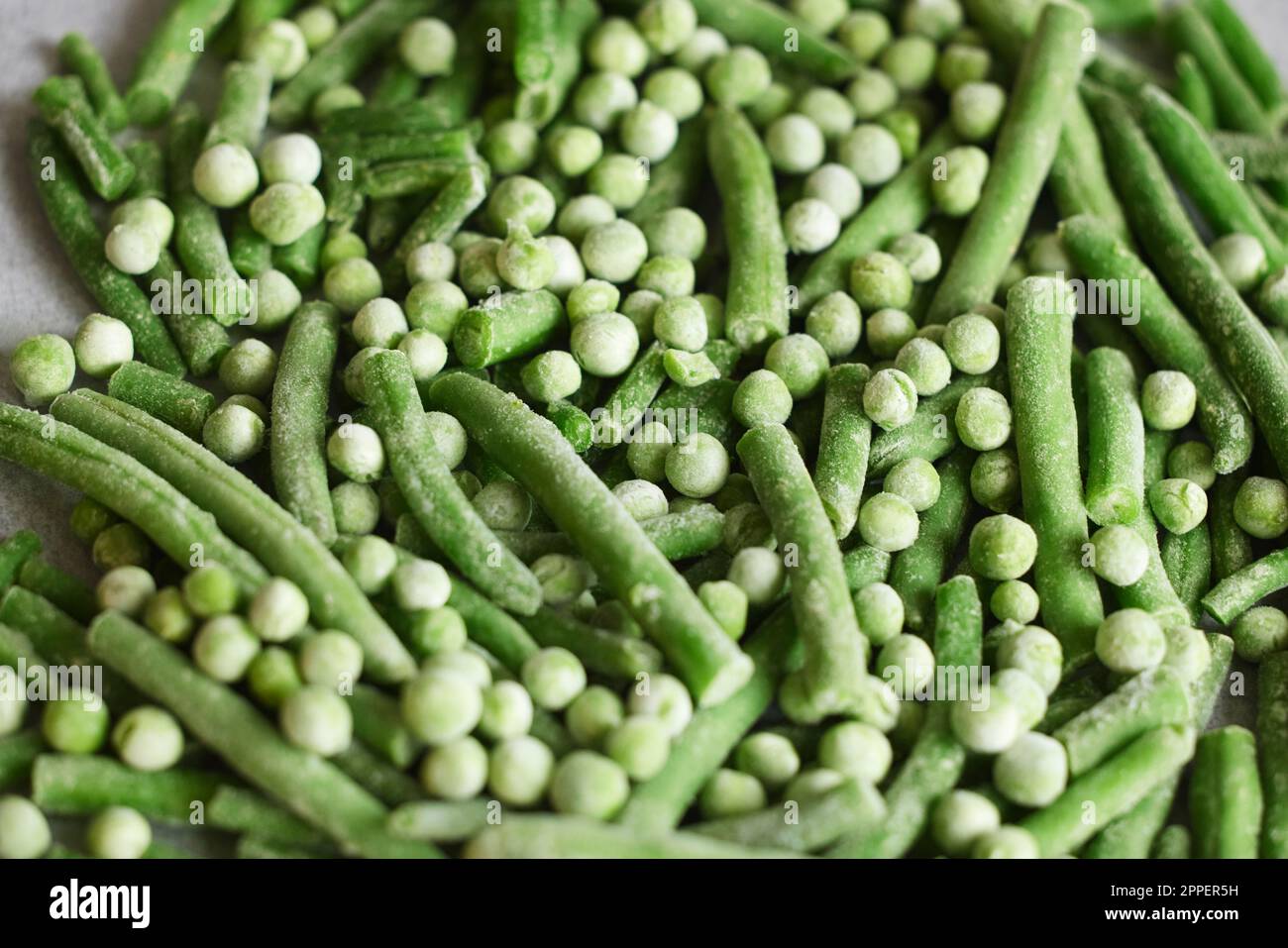 Group frozen green peas hi-res stock photography and images - Alamy