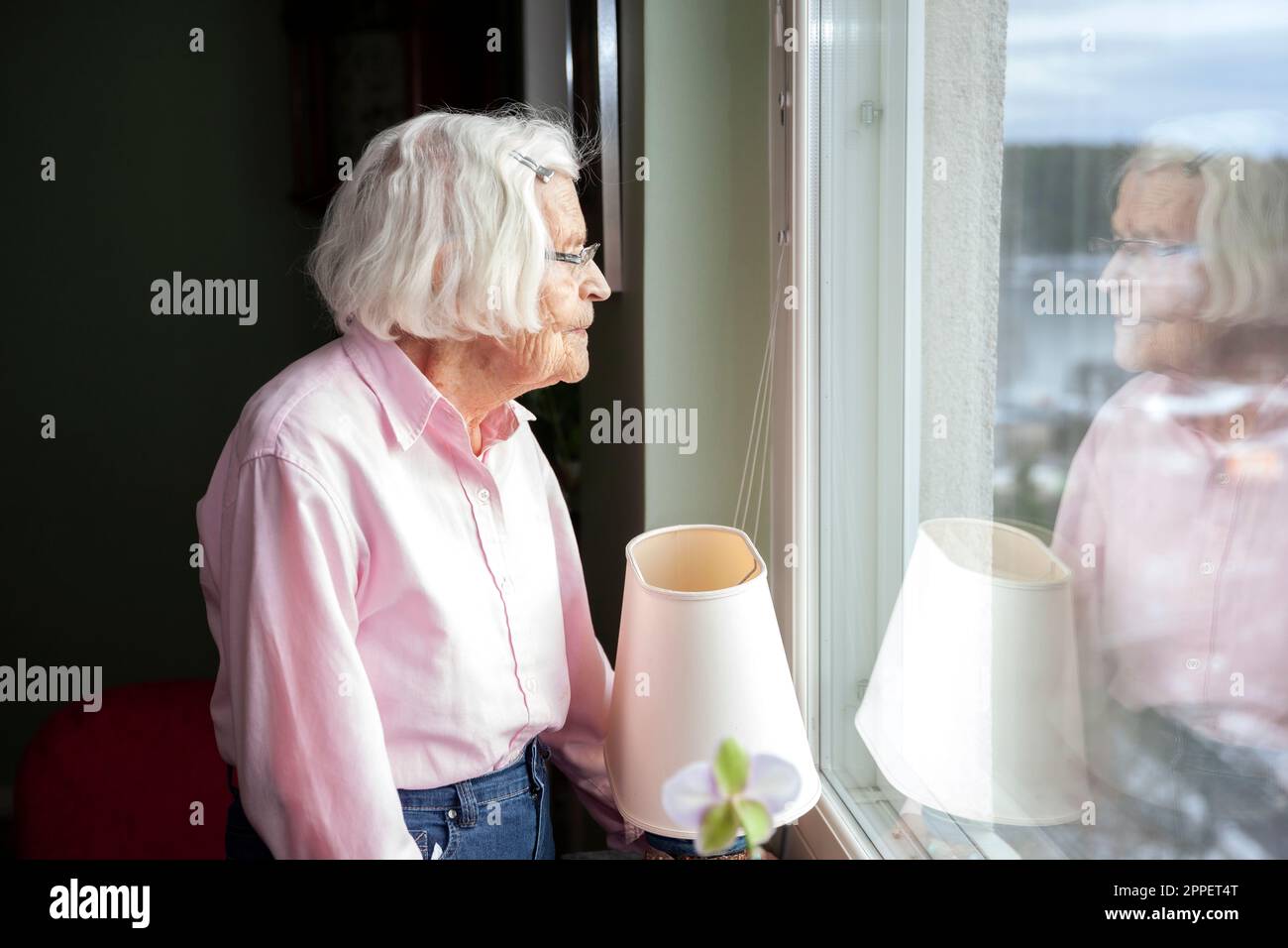 Senior lady looking through hi-res stock photography and images - Alamy